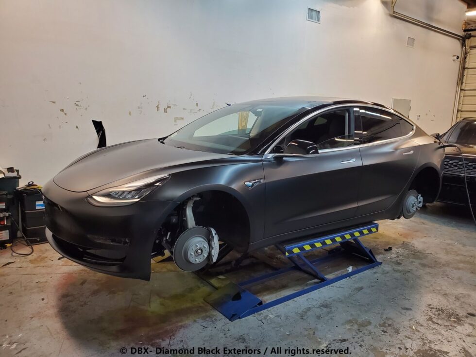 Tesla Model 3 Wrapped in Satin Black - Diamond Black Exteriors - DBX Wraps